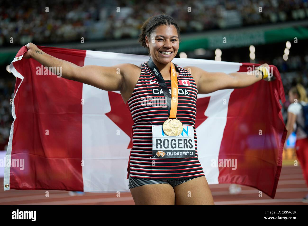 Camryn Rogers, of Canada, poses after winning the gold medal in the ...