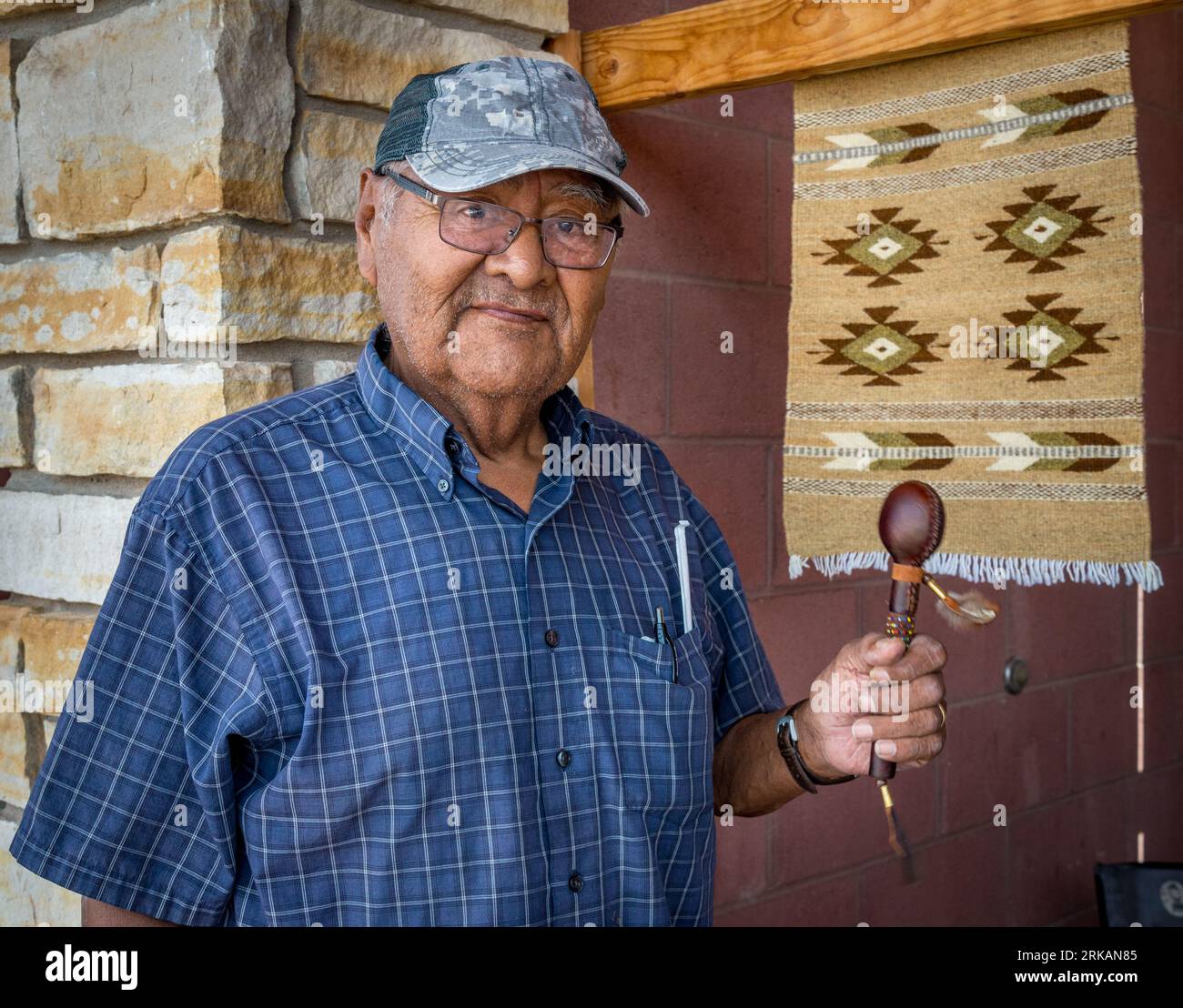 A Native American at the Indian Craft Market at Four Corners shows off ...