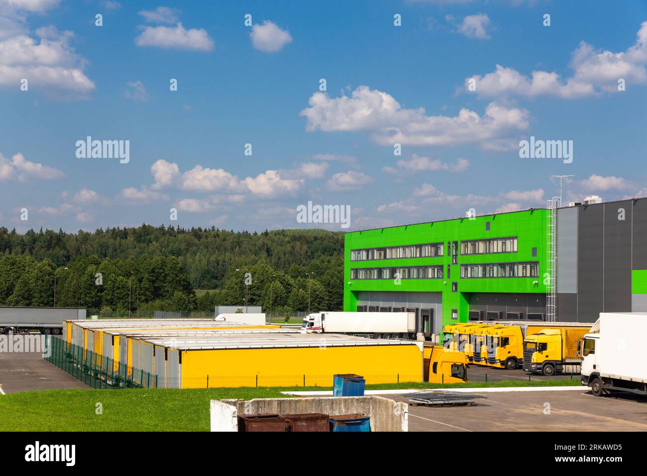 Distribution warehouse with trucks of different capacity ...
