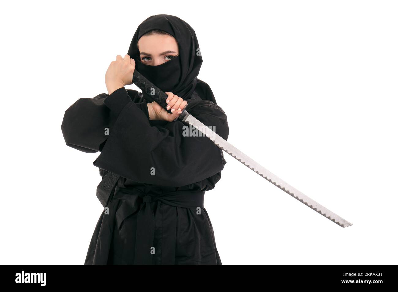 Female ninja with sword on white background Stock Photo - Alamy