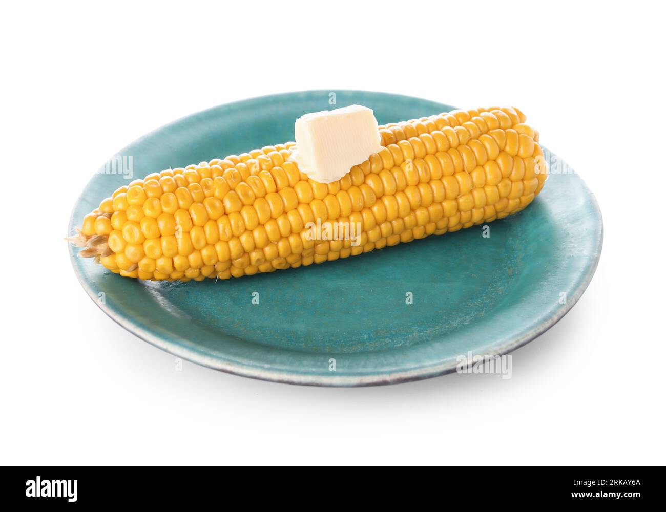 Plate of boiled corn cob with butter on white background Stock Photo ...