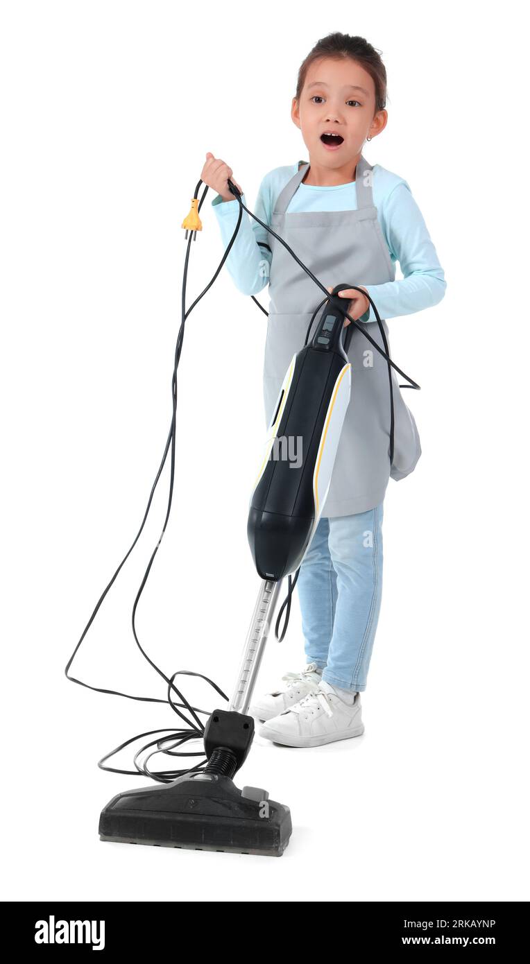 Surprised little janitor with vacuum cleaner on white background Stock ...