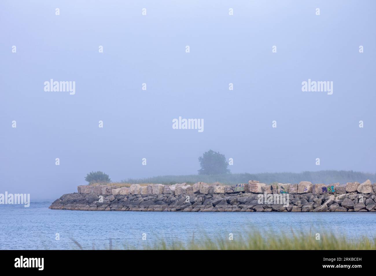 The fog coming from lake michigan on the Wisconsin coast Stock Photo ...