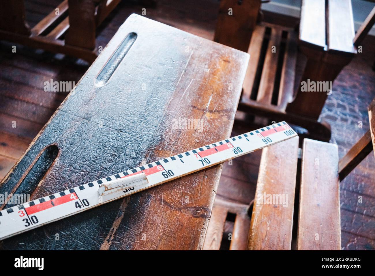 A metric ruler on a desk from another era, made of wood, vintage Stock ...