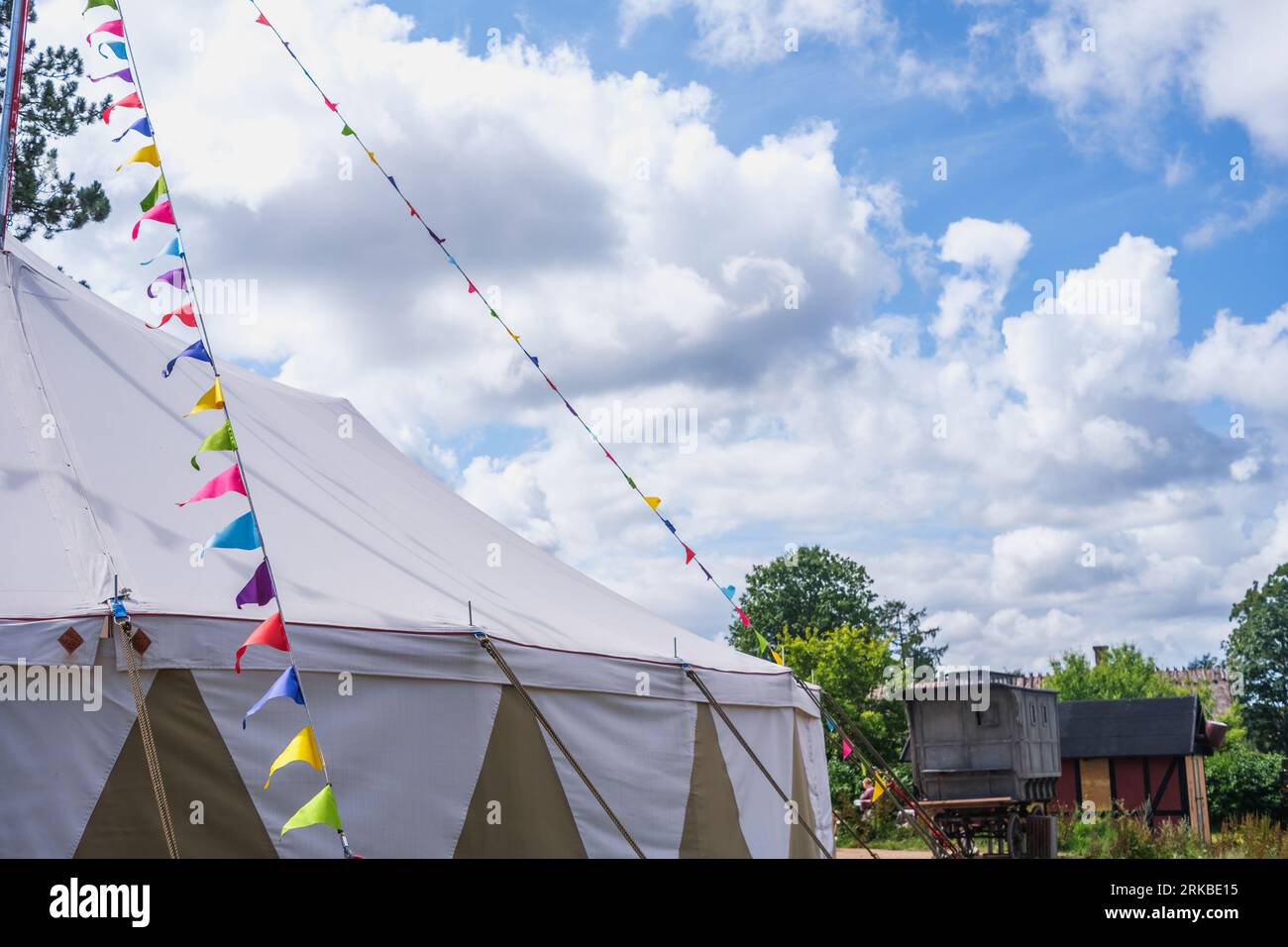 A circus tent with banners Stock Photo - Alamy