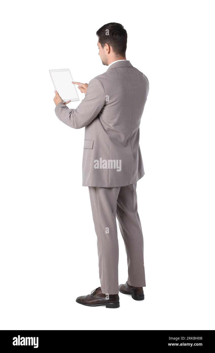 Man using tablet with blank screen on white background Stock Photo - Alamy