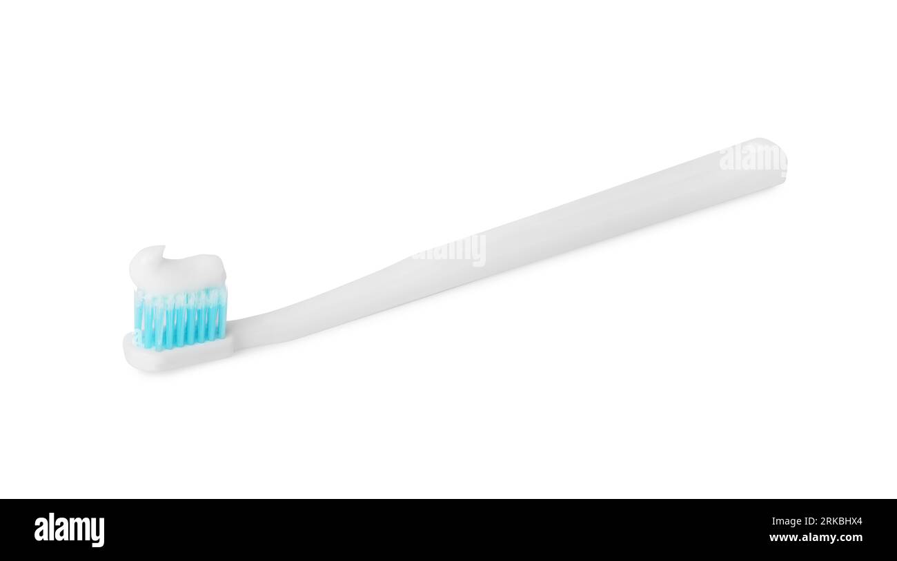 Plastic toothbrush with paste on white background Stock Photo - Alamy