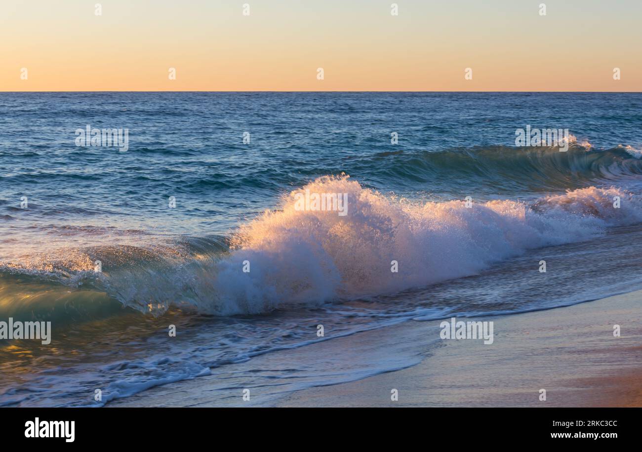 Blue wave on the beach. Dramatic natural background Stock Photo - Alamy