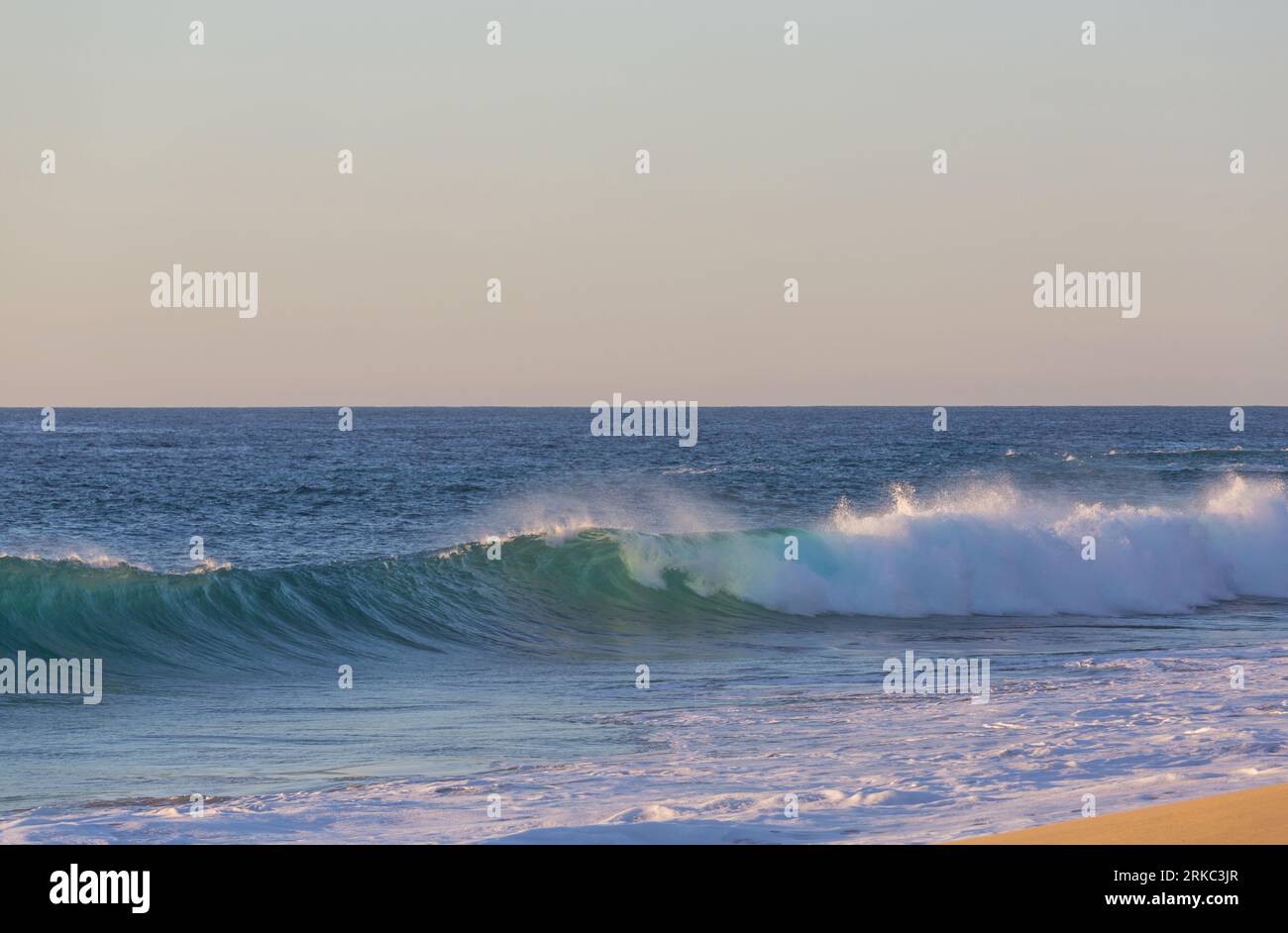 Blue wave on the beach. Dramatic natural background Stock Photo - Alamy