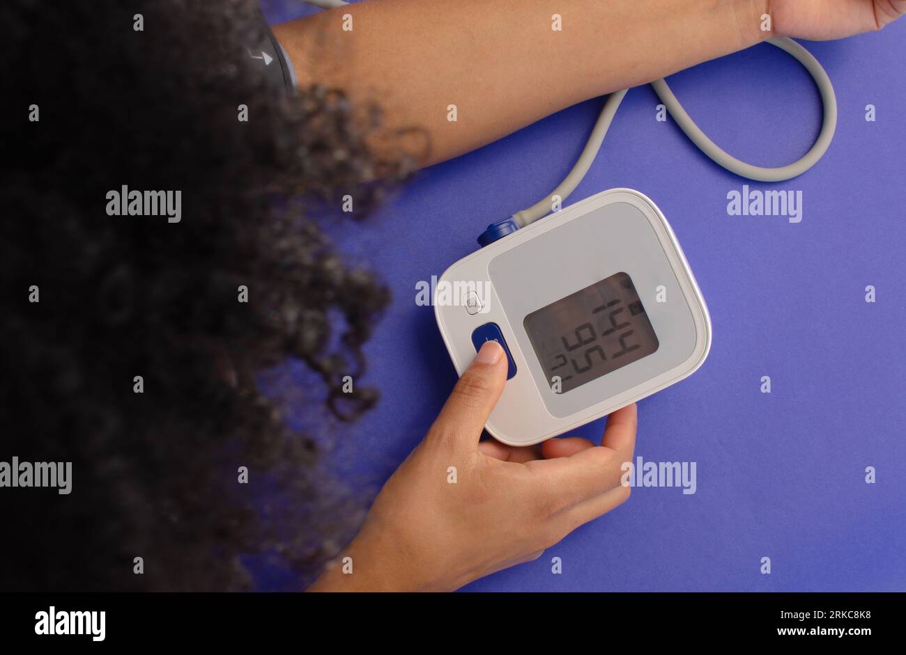 Detail of a modern blood pressure measuring device, symbolizing the ...