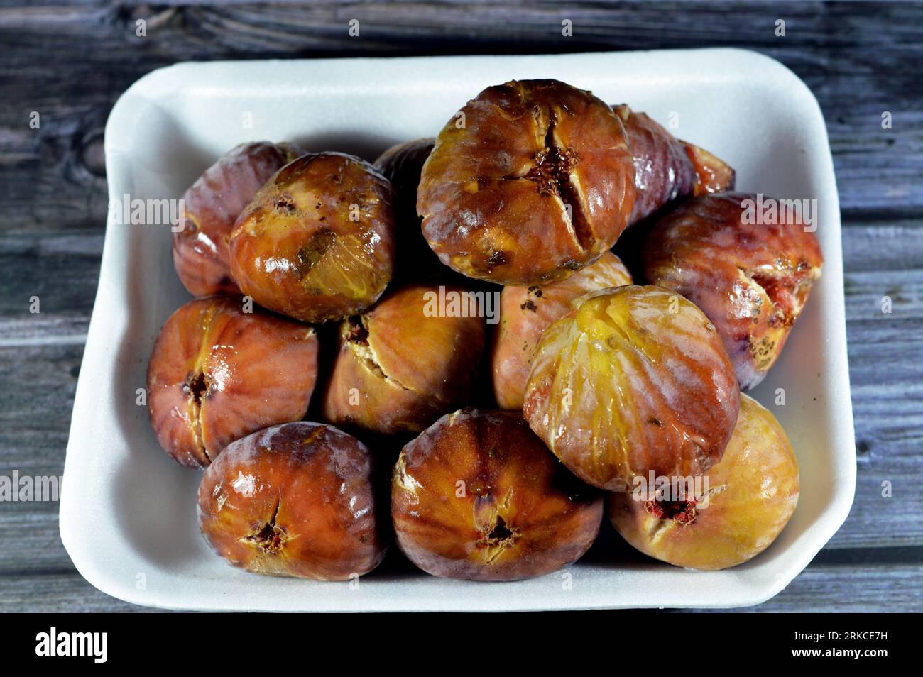 plate of fresh figs fruit, The fig is the edible fruit of Ficus carica ...
