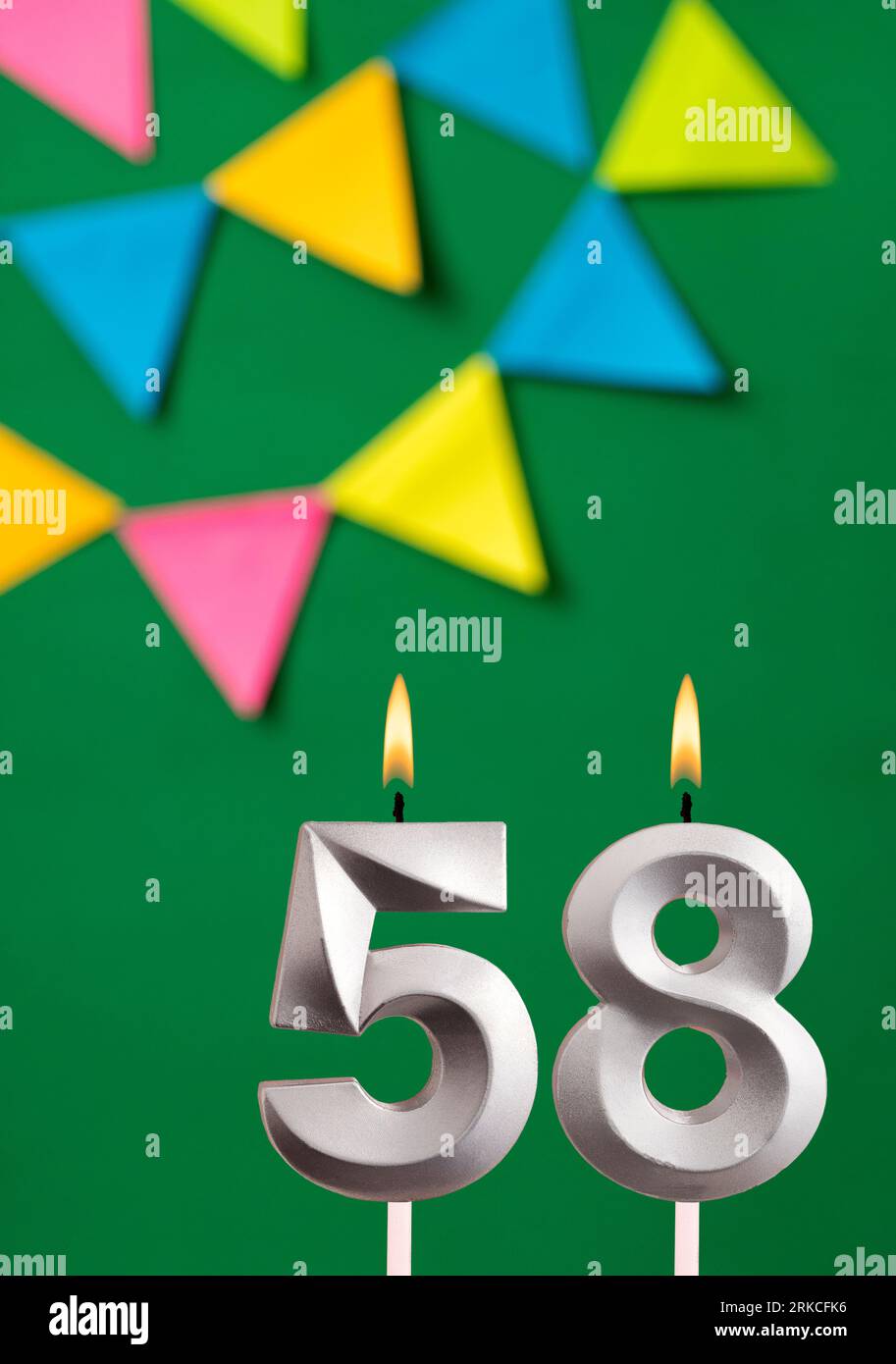 Vertical birthday card with number 58 candle - Green background with ...
