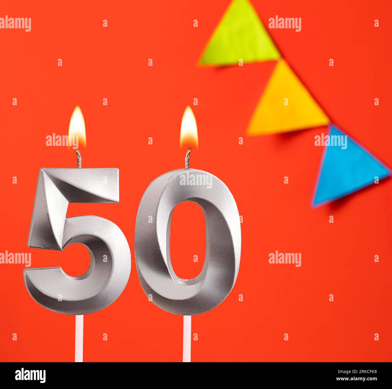 Birthday card - Number 50 candle in orange background Stock Photo - Alamy