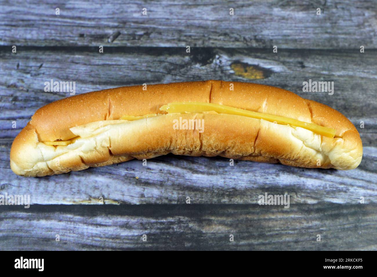 Rumi Cheese sandwich in a long bun, Slices of Egyptian Rumi cheese ...