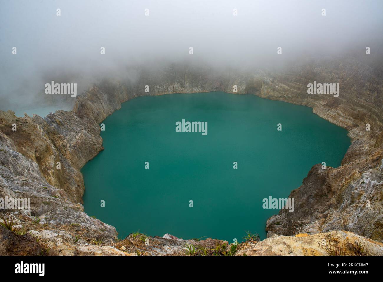 Turquoise green volcanic lake, Kelimutus, Flores island, Indonesia ...