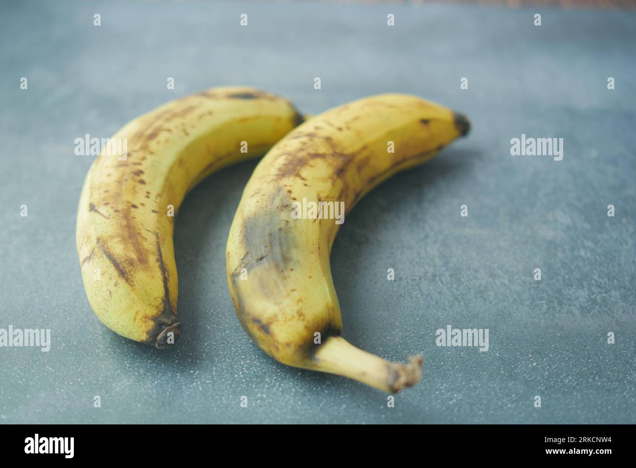 comparing rotten banana with a ripe banana on a white background Stock ...