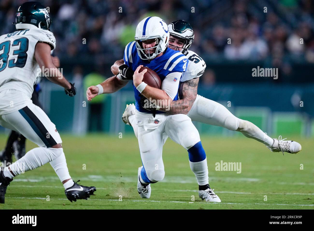 Indianapolis Colts quarterback Sam Ehlinger (4) is stopped by ...