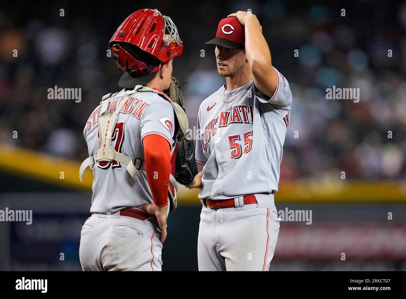 Cincinnati Reds' starting pitcher Brandon Williamson (55) talks with ...