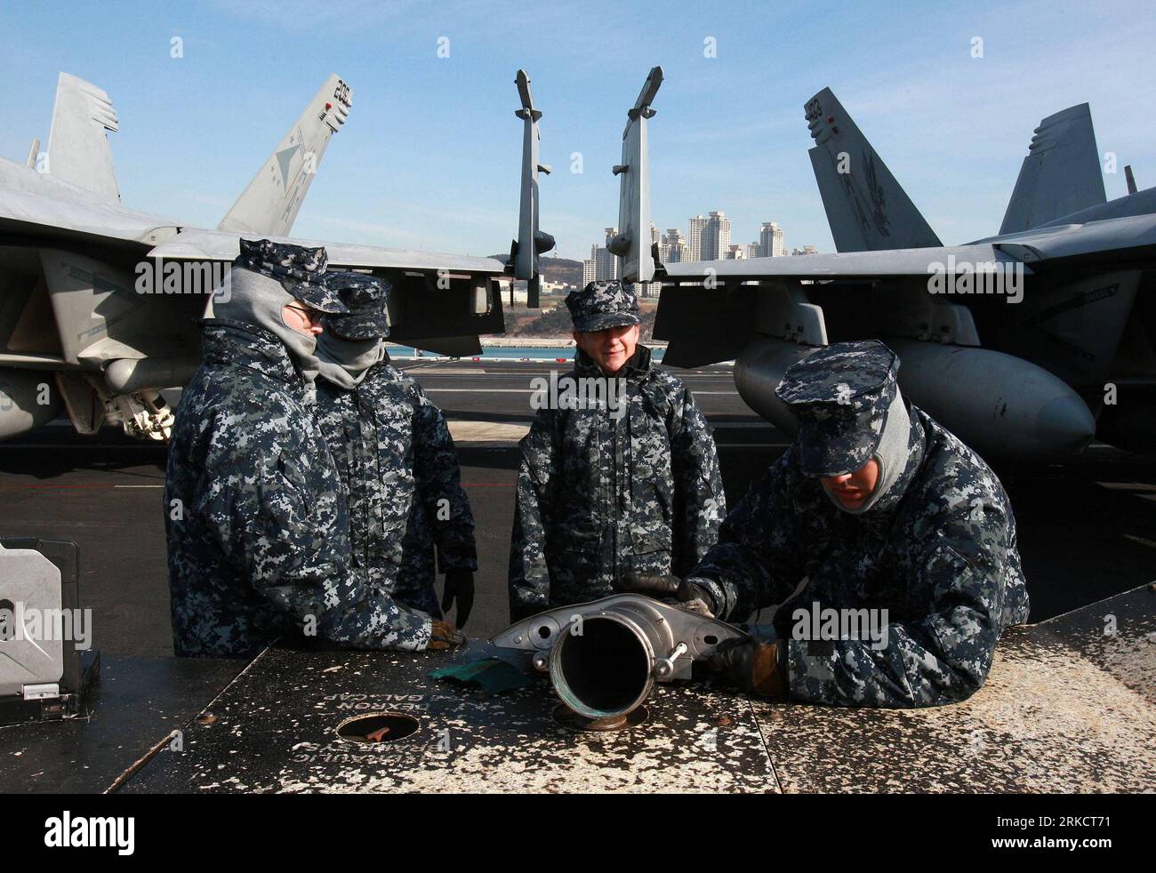 Us navy deck crew members hi-res stock photography and images - Alamy