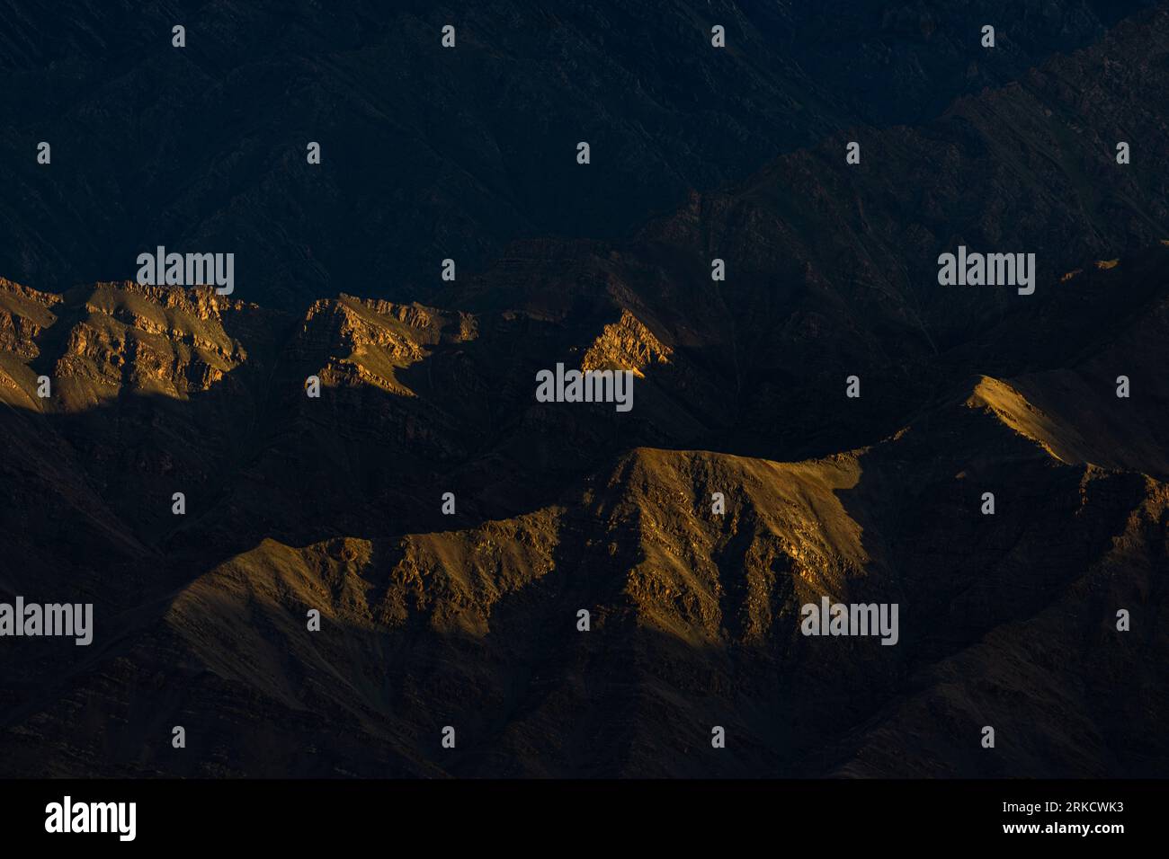 View of high altitude mountains in Ladakh with sun rays and shadows ...