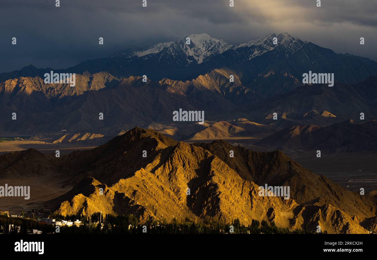 View of high altitude mountains in Ladakh with sun rays and shadows ...