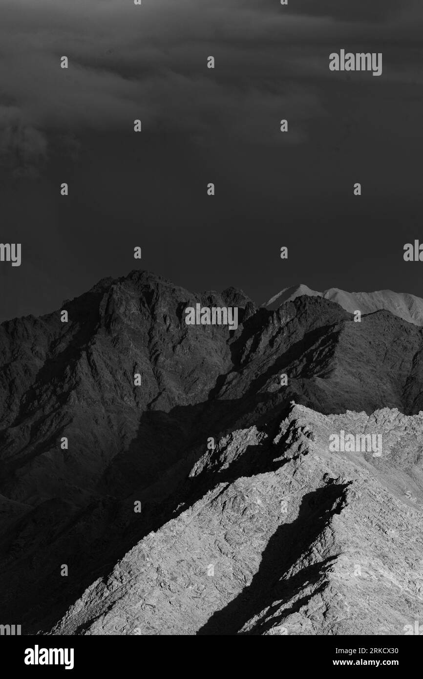 Landscape of light and shadows falling on mountains as fine art Stock ...