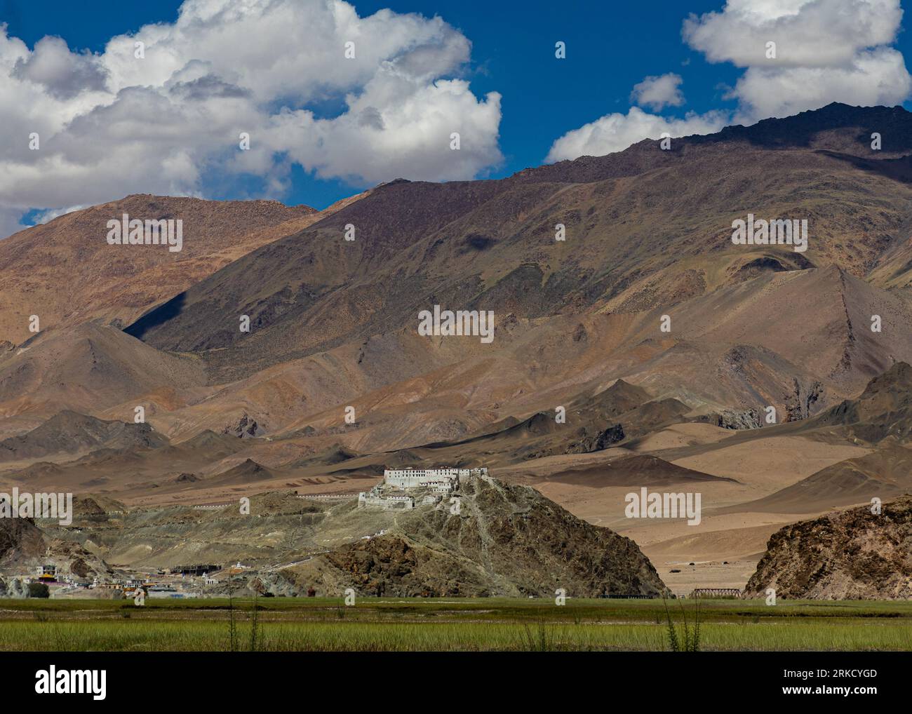 Hanle monastery on top of a hill with mountains and clouds at Ladakh ...