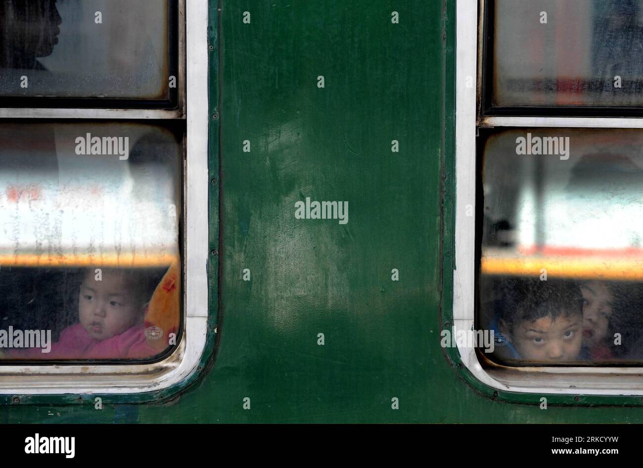 Children through train windows hi-res stock photography and images - Alamy