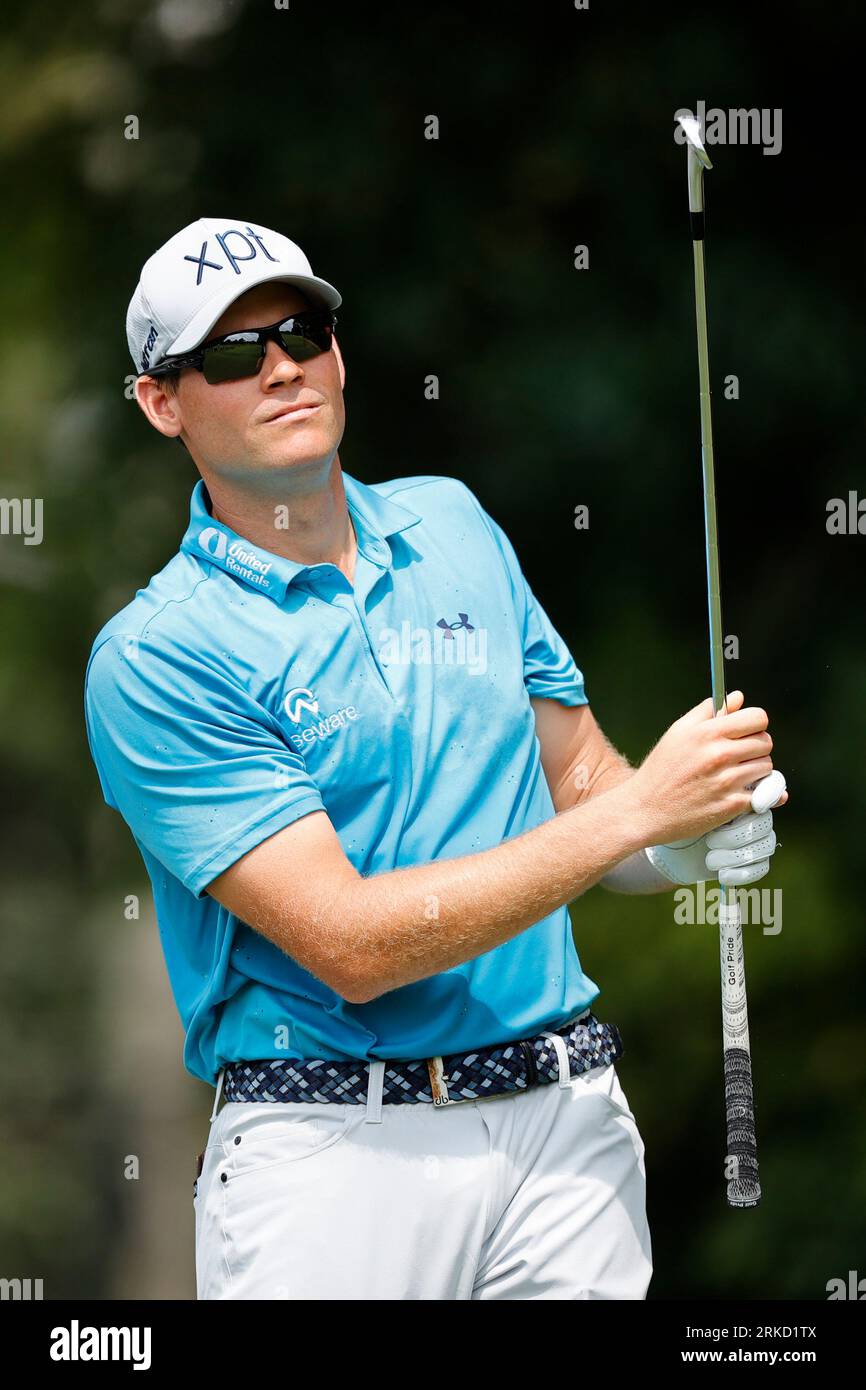 Adam Schenk watches his tee shot on the second hole during the first ...