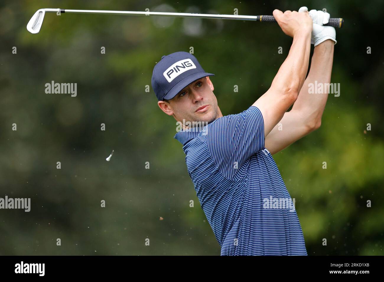 Taylor Moore hits a tee shot on the second hole during the first round ...