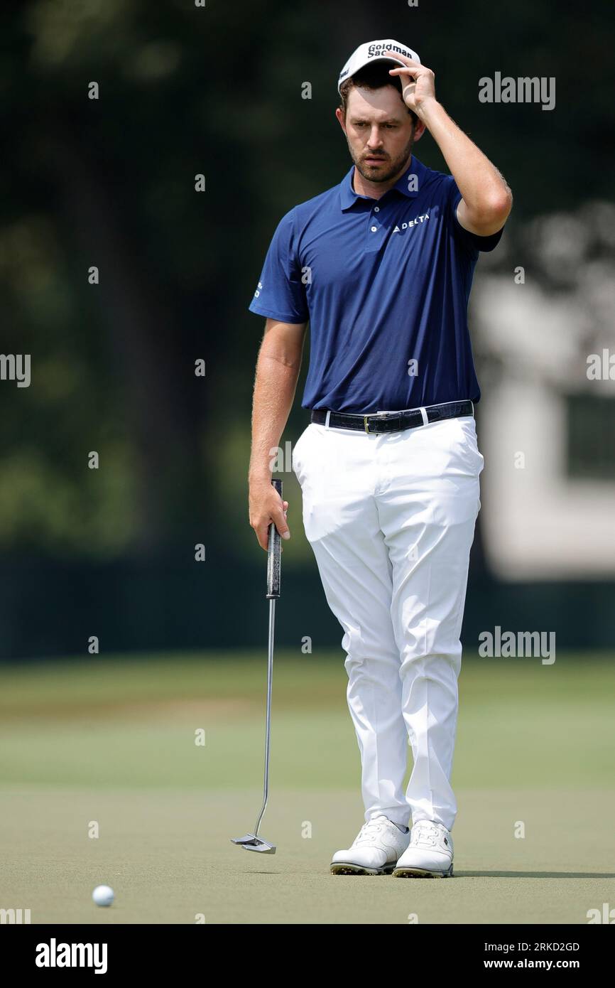 Patrick Cantlay lines up a putt on the first green during the first ...