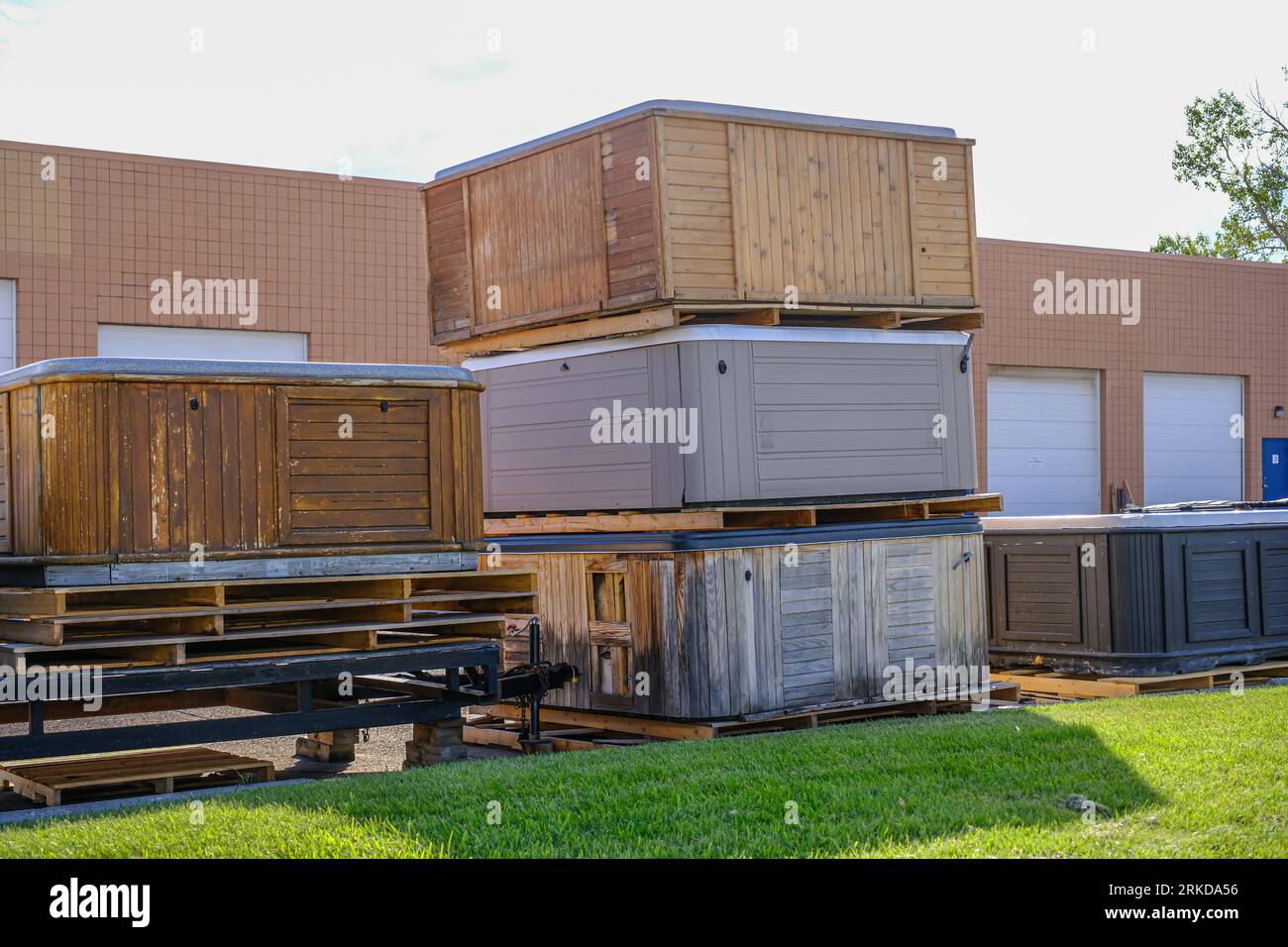 old discarded hot tubs ready for recycling Stock Photo - Alamy