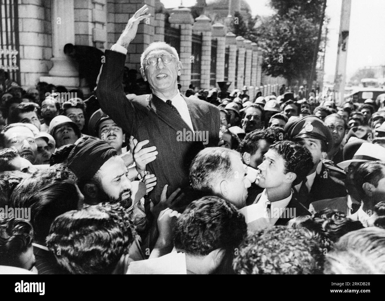 FILE - Prime Minister Mohammad Mosaddegh rides on the shoulders of ...