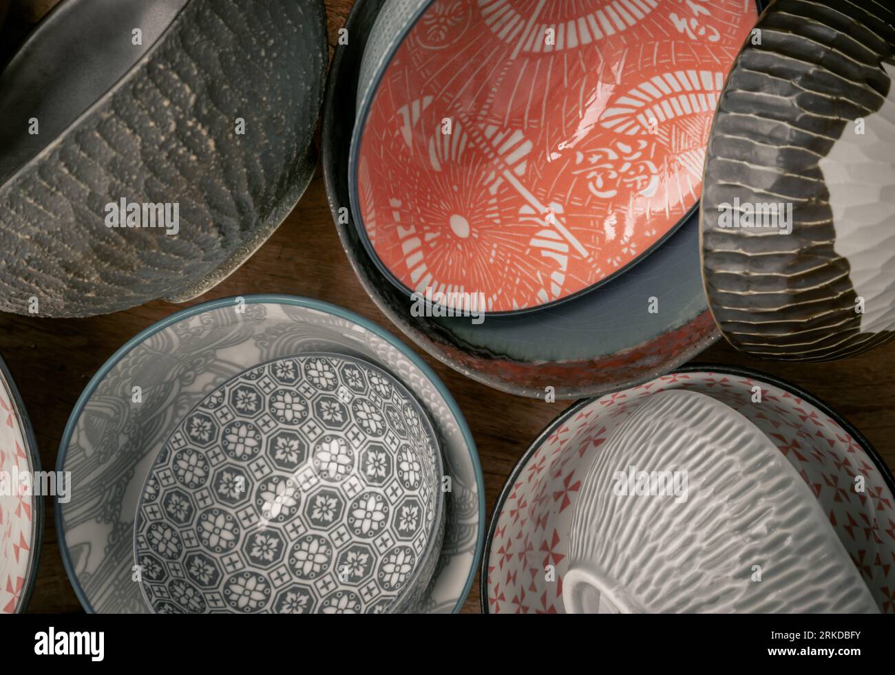 Collection of ceramic bowls on rustic wood background. Great ...