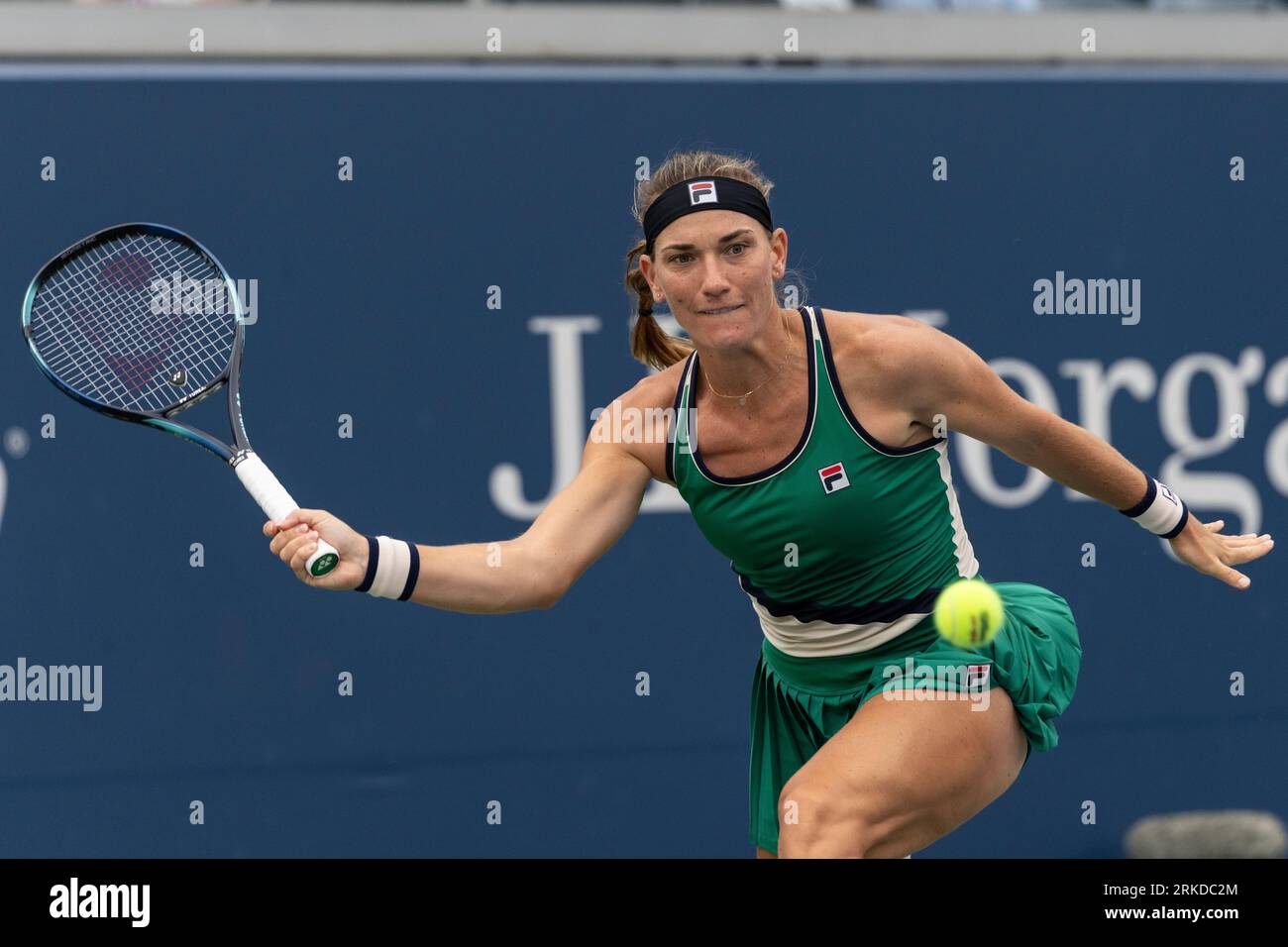 Timea Babos of Hungary returns ball during 2nd round match against ...