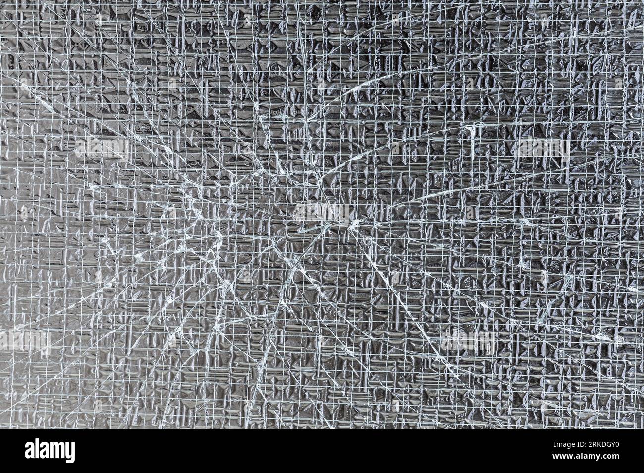 Broken laminated safety glass background and texture Stock Photo - Alamy