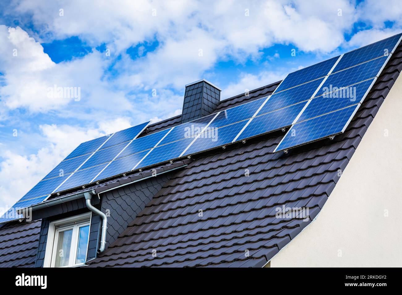 Photovoltaic panels on the roof of family house, solar panels ...