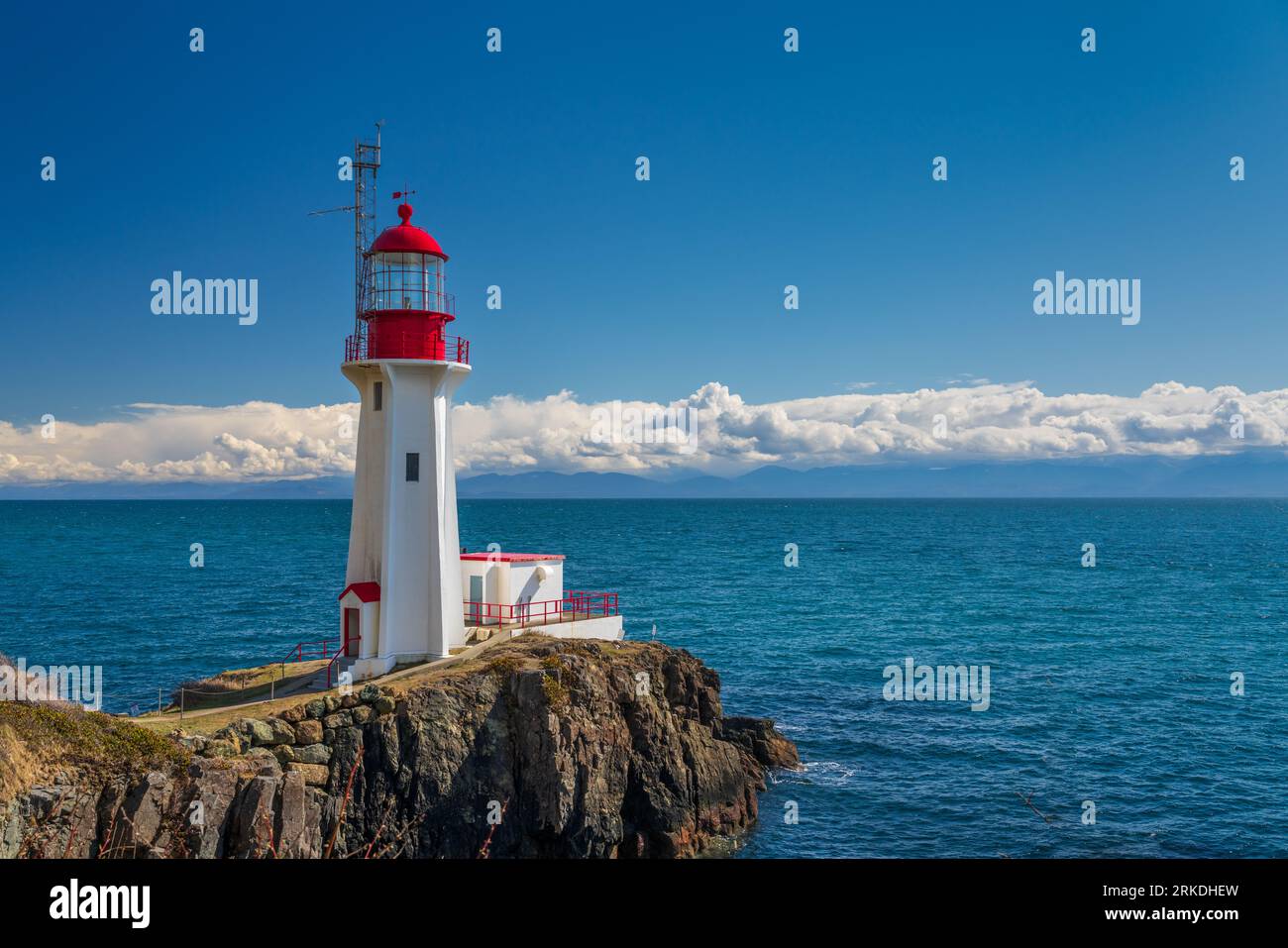 The Shweinham Point Lighthouse overlooking the Strait of Juan de Fuca ...