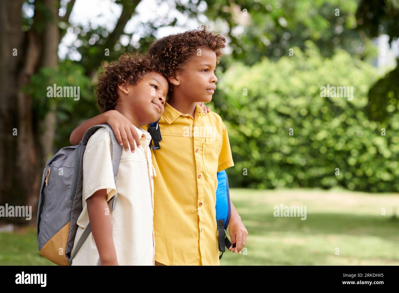 Portrait two brothers standing back hi-res stock photography and images ...