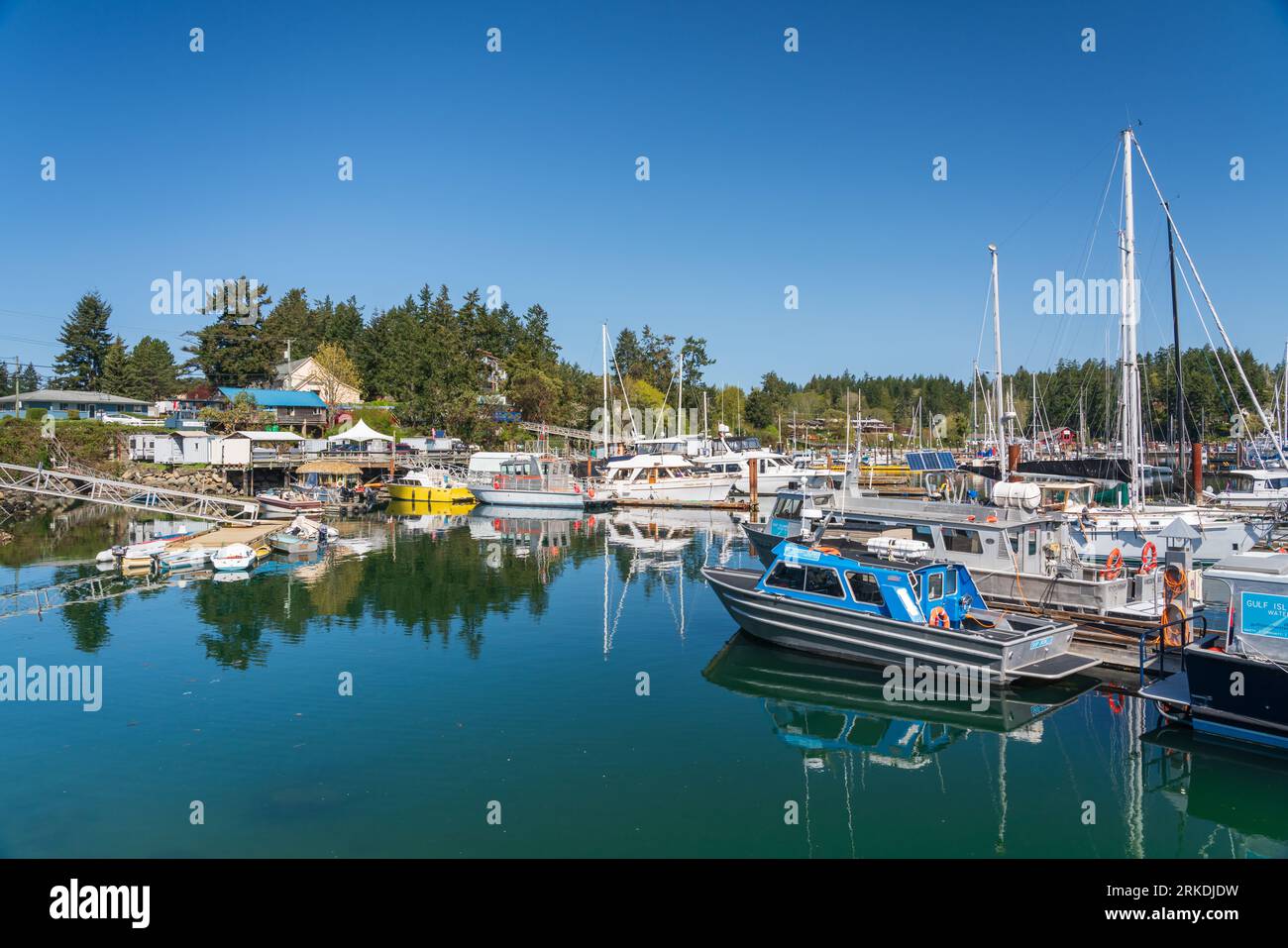 The Ganges Marina reflections of boats on Saltspring Island, British ...