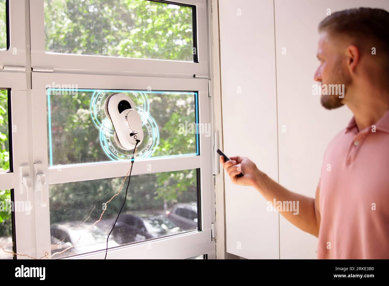 Automatic Glass Cleaner Robot. Home Washing Equipment Stock Photo - Alamy