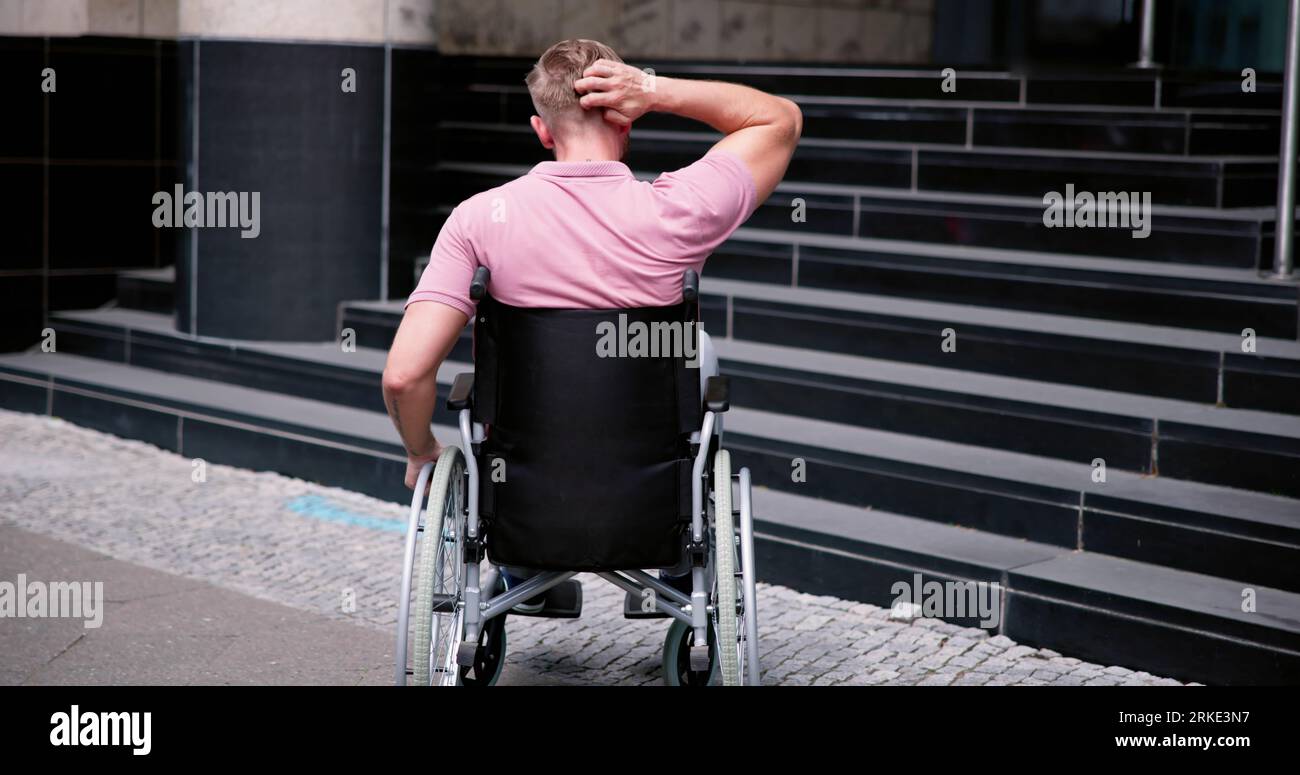 Paralyzed Man With Disability Stair Access Problem Stock Photo - Alamy