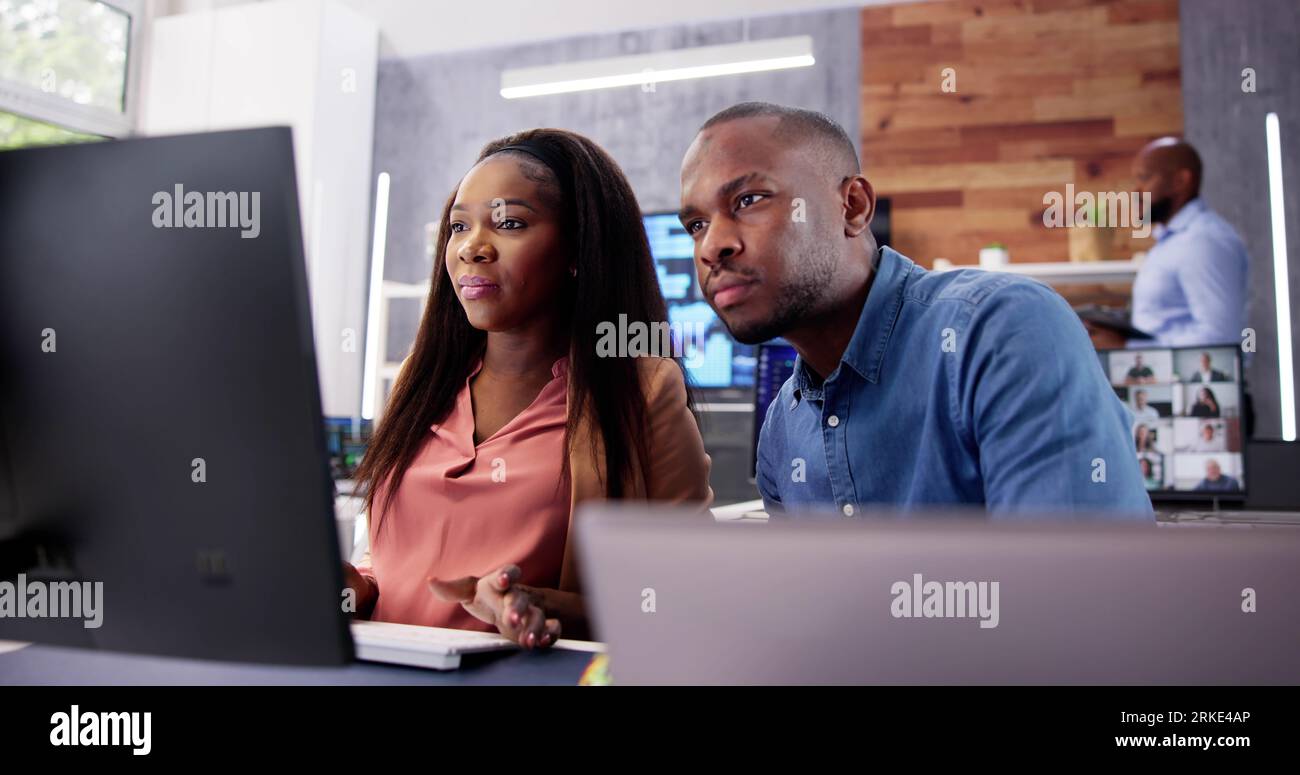 African Financial Data Analysts Using Performance Dashboard On Screens ...