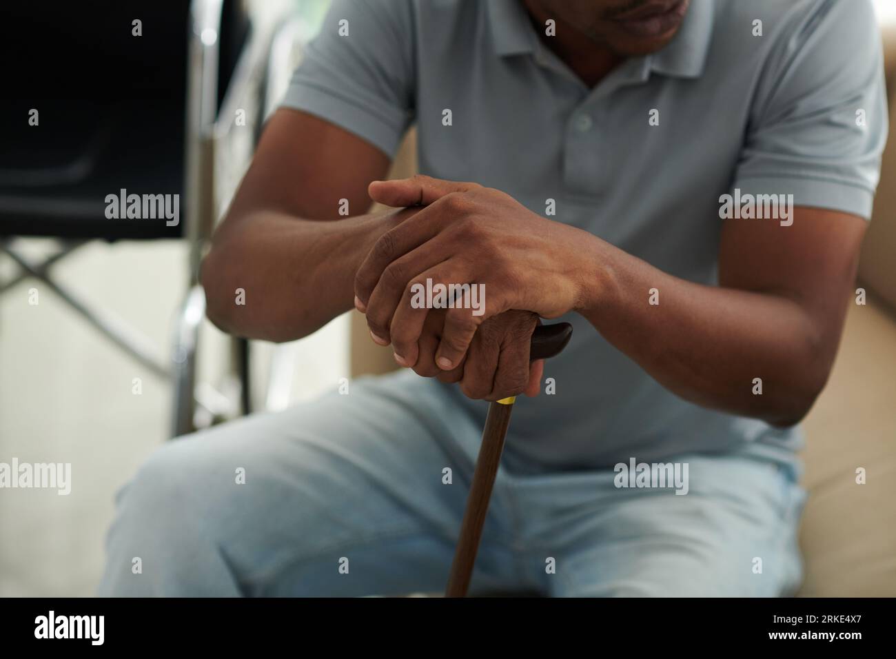 Leaning on walking stick hi-res stock photography and images - Alamy