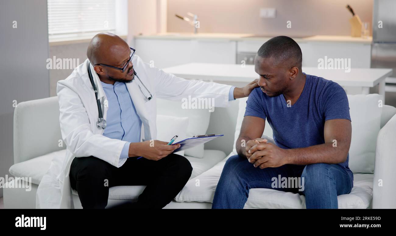 Doctor Talking With African Patient. Medical Caregiver Stock Photo - Alamy