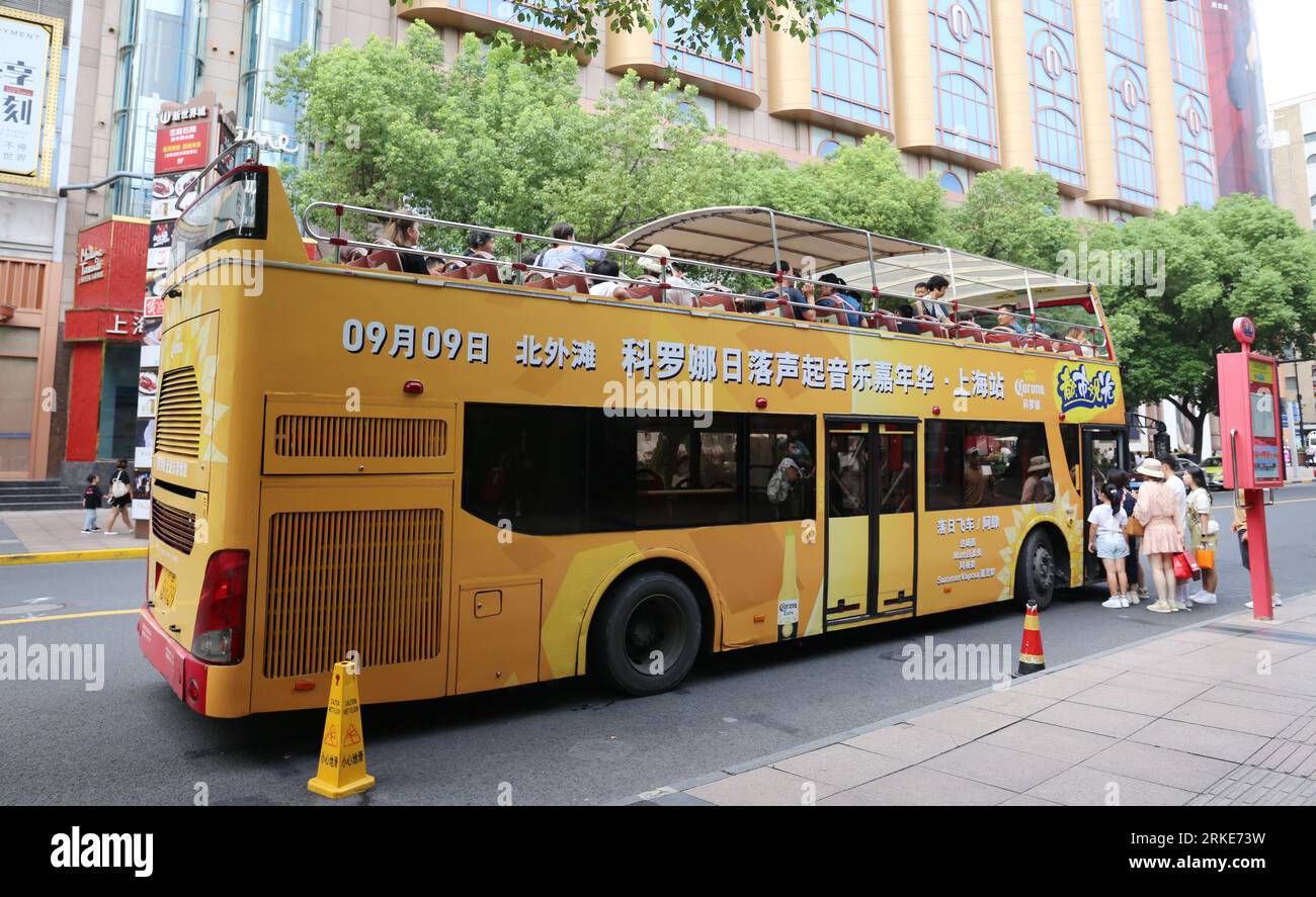 SHANGHAI, CHINA - AUGUST 24, 2023 - Tourists take a new energy electric ...