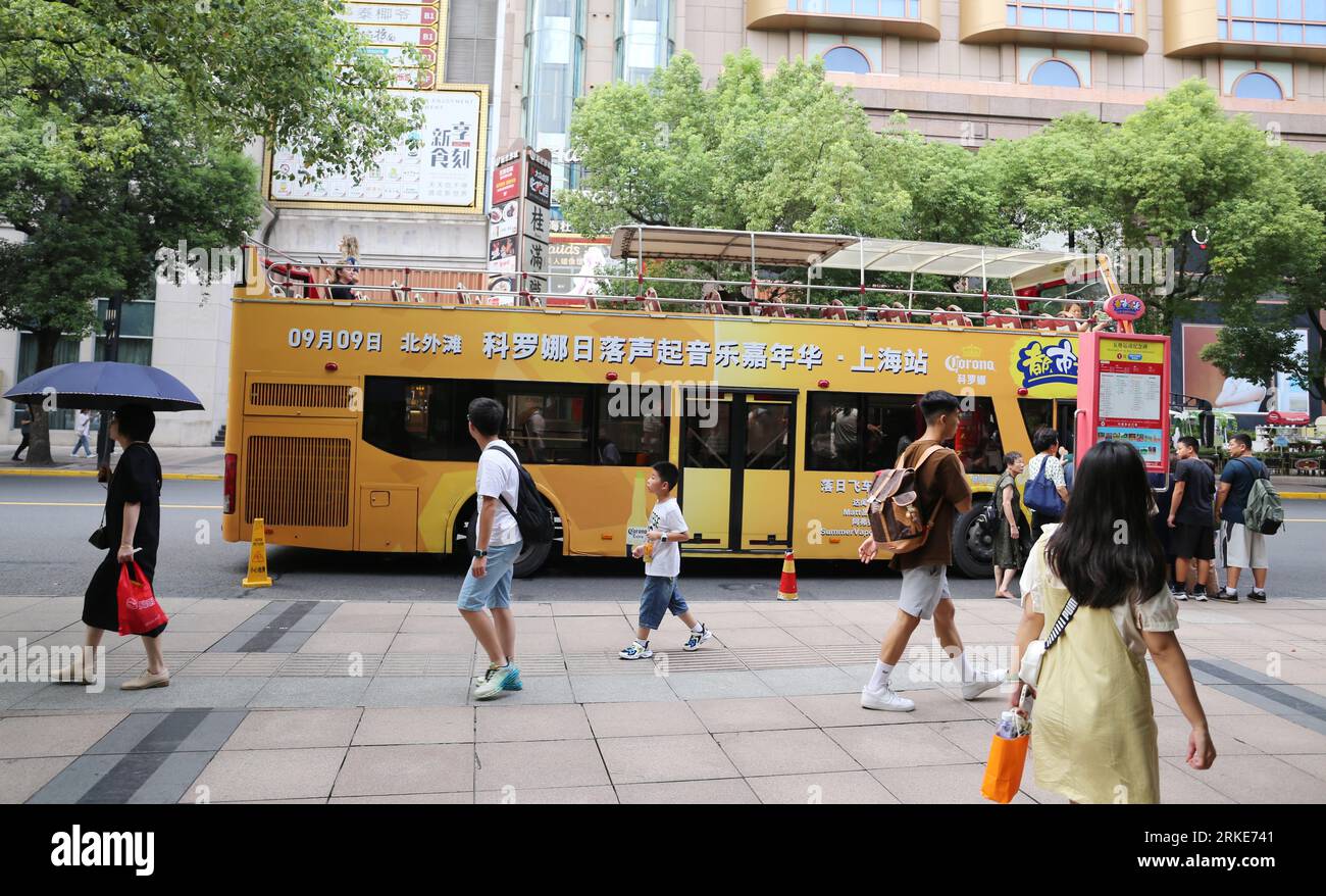 SHANGHAI, CHINA - AUGUST 24, 2023 - Tourists take a new energy electric ...