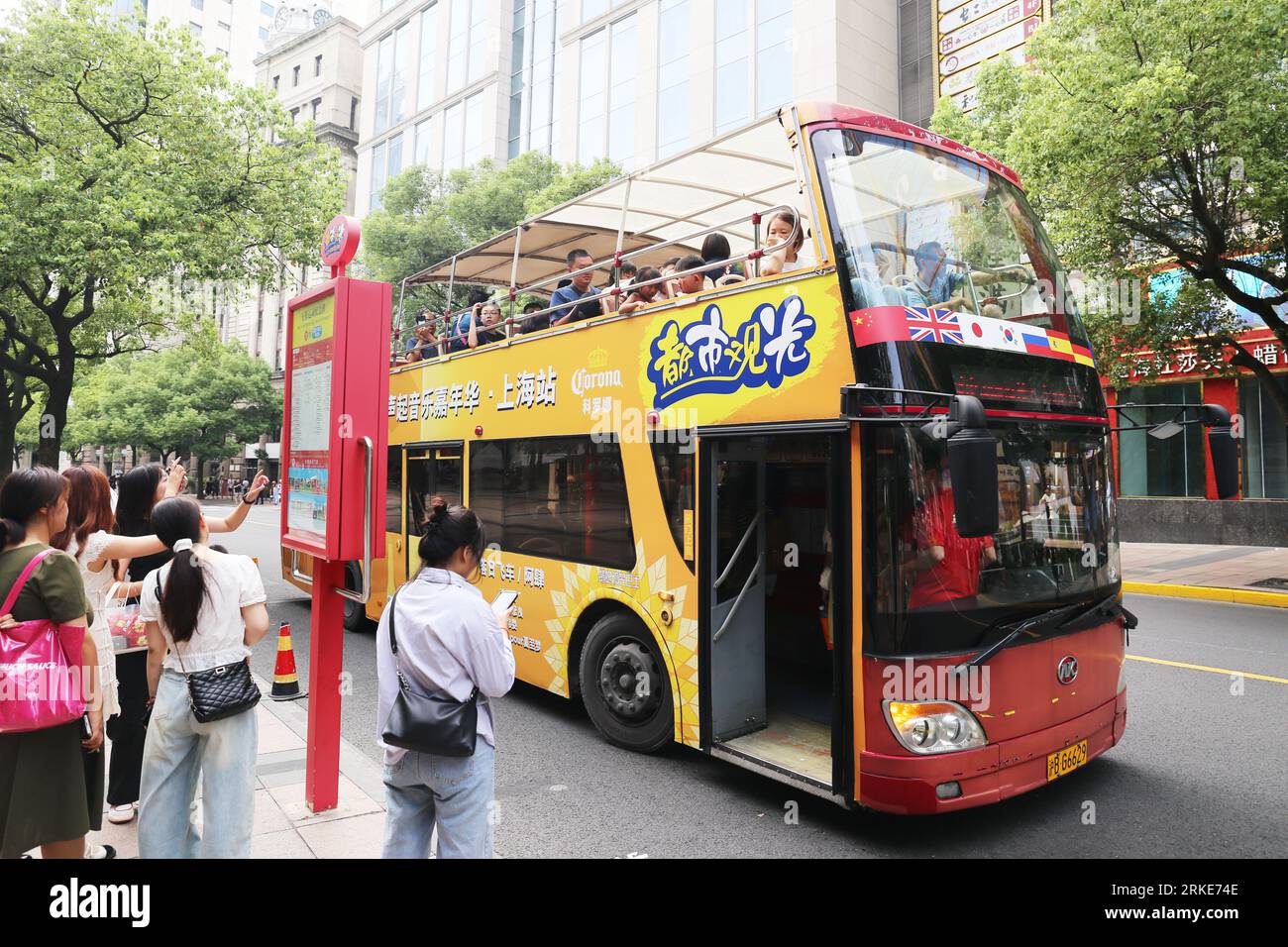 SHANGHAI, CHINA - AUGUST 24, 2023 - Tourists take a new energy electric ...