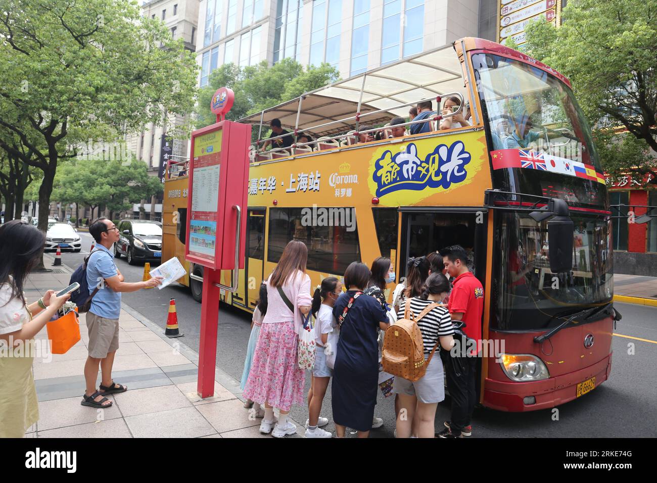 SHANGHAI, CHINA - AUGUST 24, 2023 - Tourists take a new energy electric ...