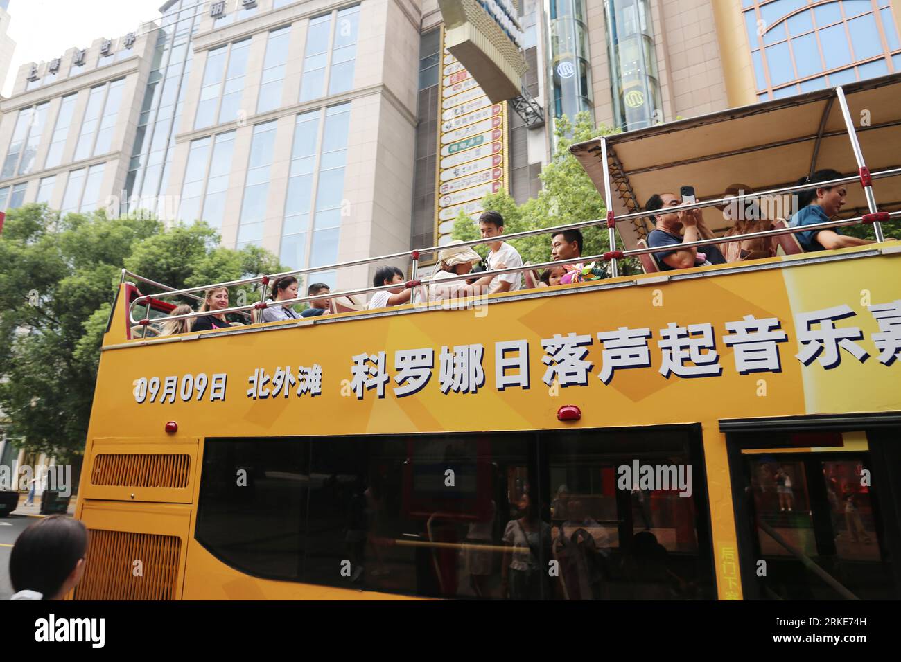 SHANGHAI, CHINA - AUGUST 24, 2023 - Tourists take a new energy electric ...